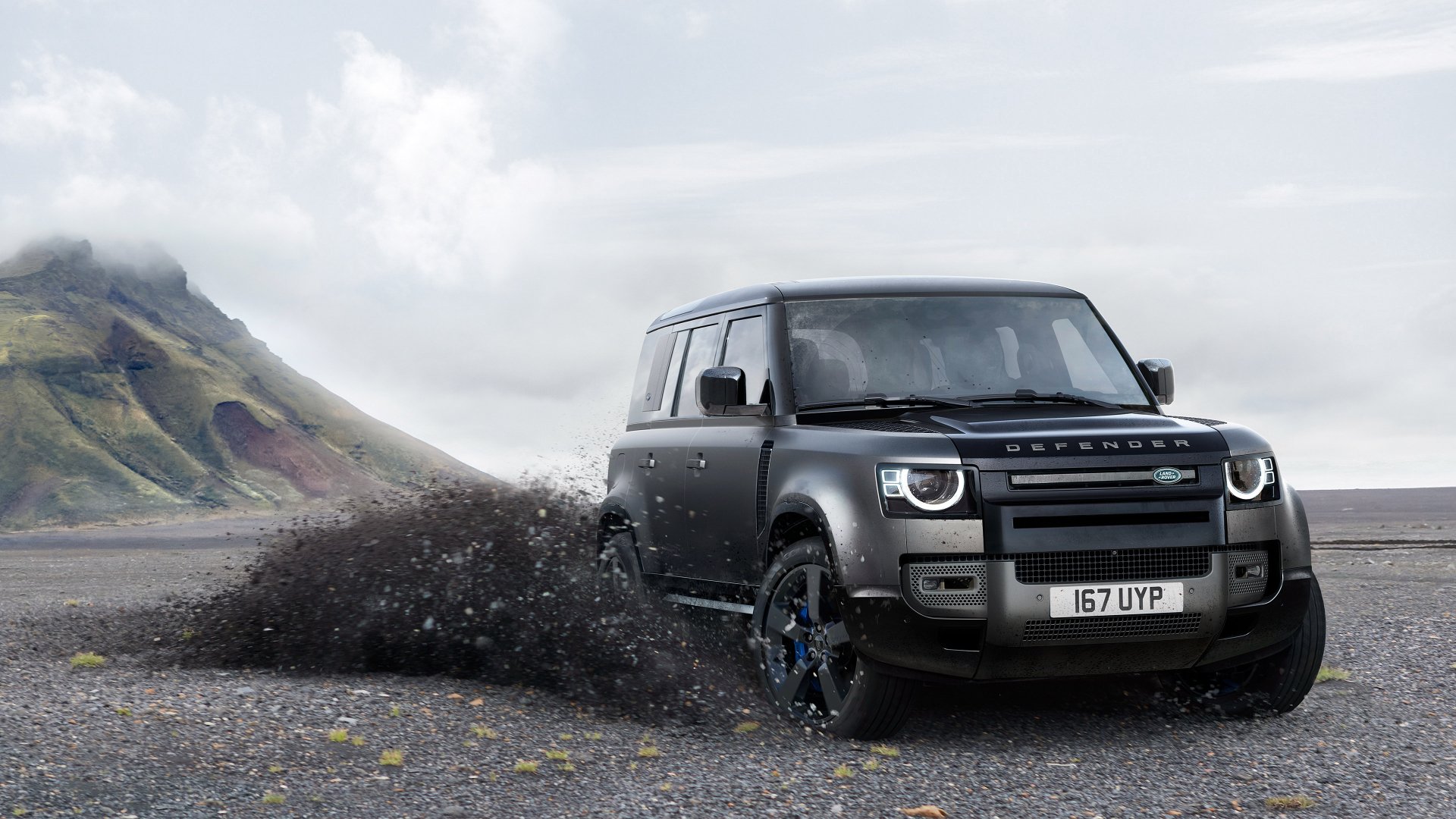 Land Rover Defender 4K Ultra HD: Bold Black SUV Conquering Rugged Terrain