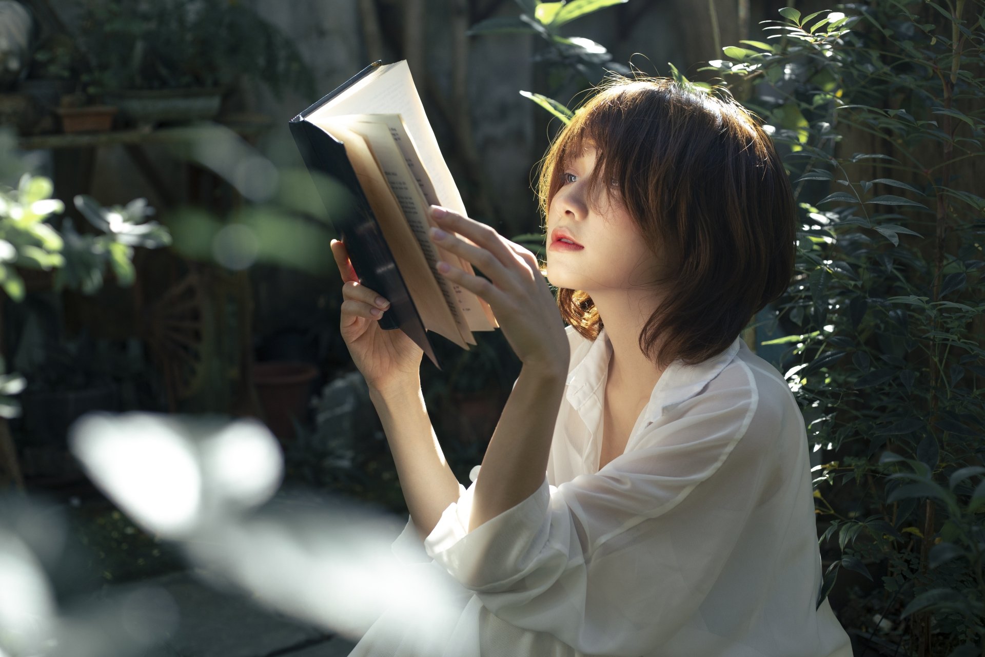 Serene Asian Woman Reading in 4K Ultra HD