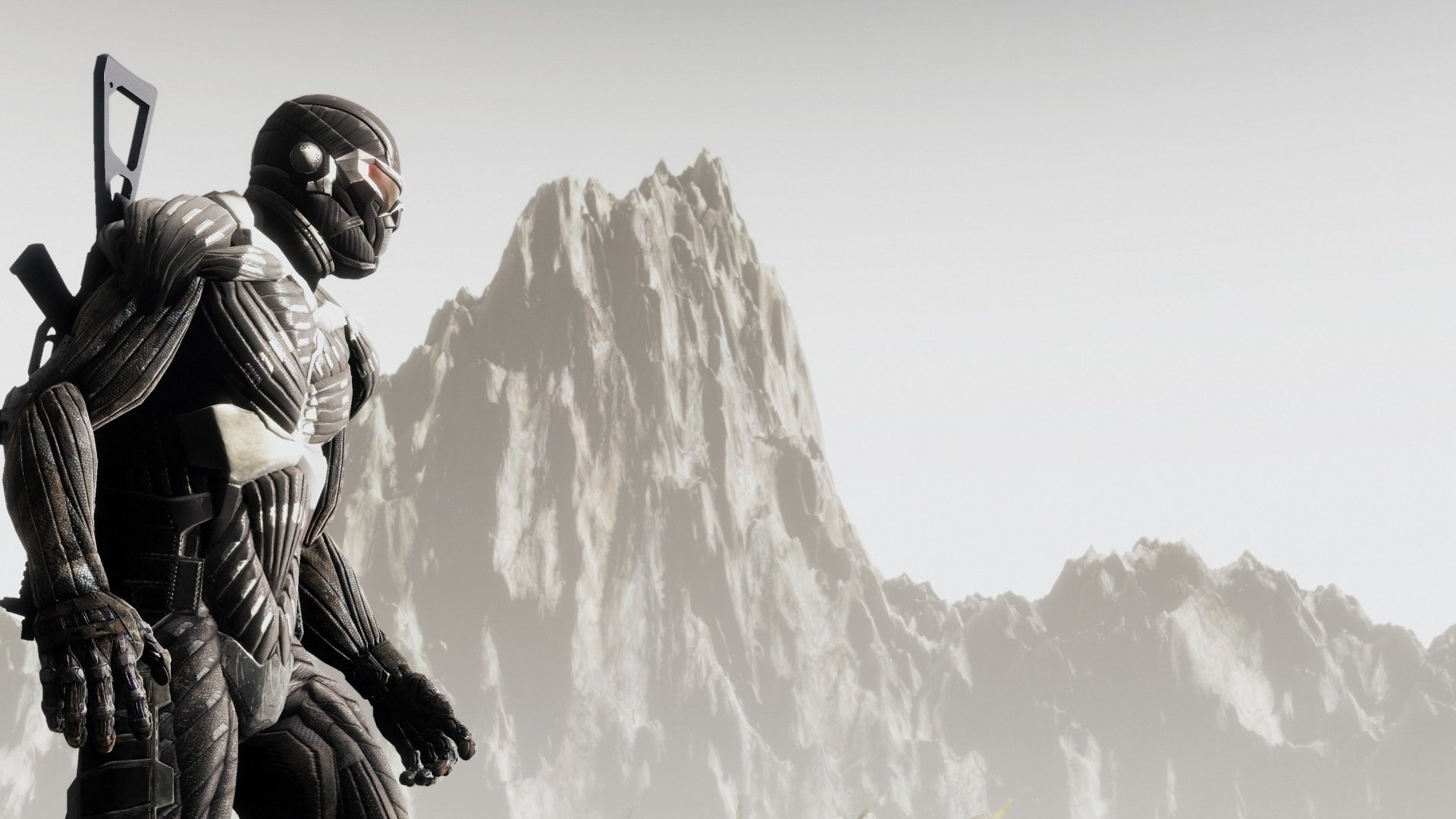 Crysis 2 HD Wallpaper: Futuristic Warrior in Mountainous Terrain