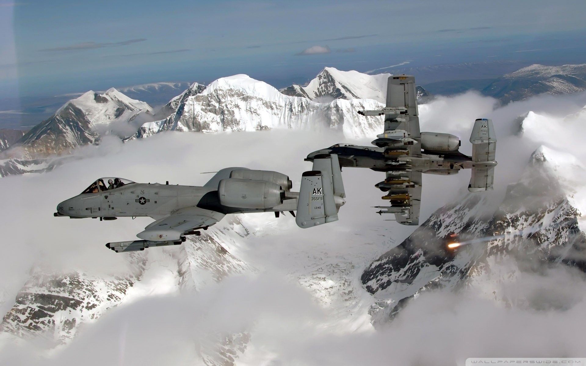 A-10 Thunderbolt II Soaring Over Majestic Mountains – HD Military Wallpaper