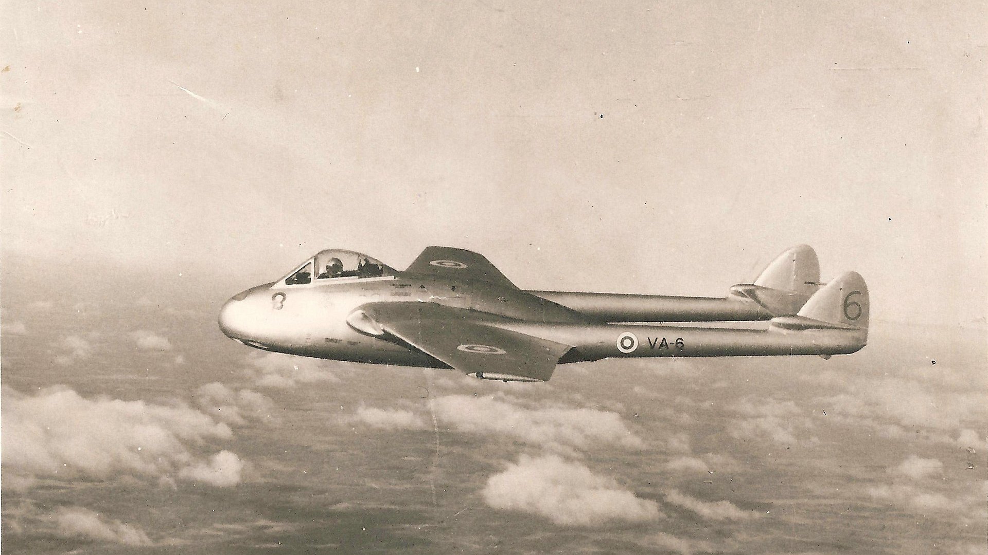 High-Definition Military Aircraft in Flight – Vintage Aerial Power