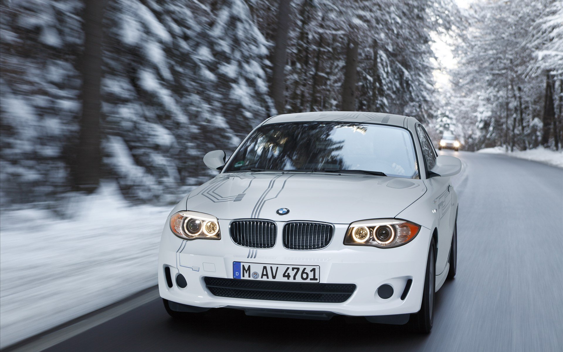 BMW Elegance: HD Winter Drive Wallpaper