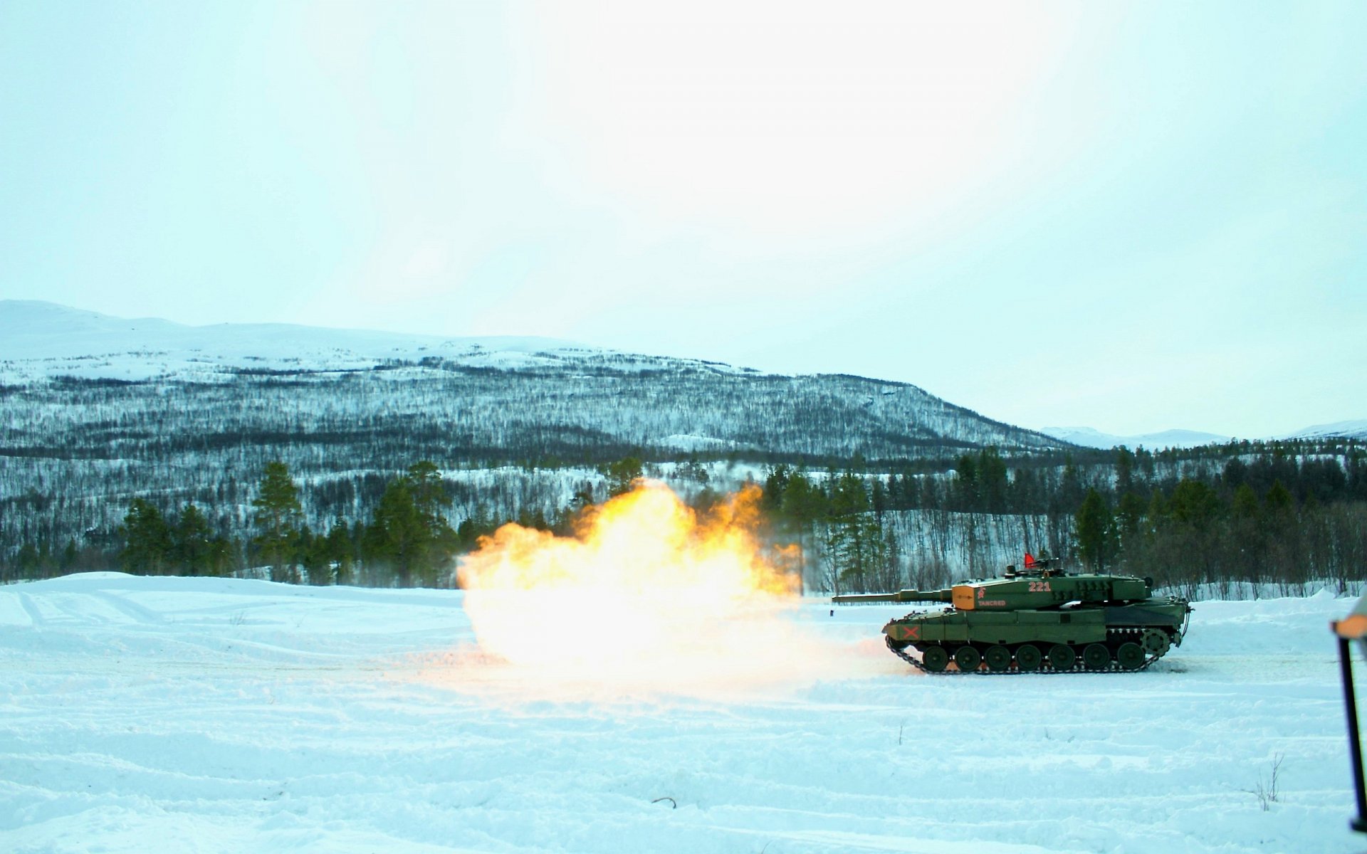 HD Military Power: Tank in Action on Snowy Battlefield