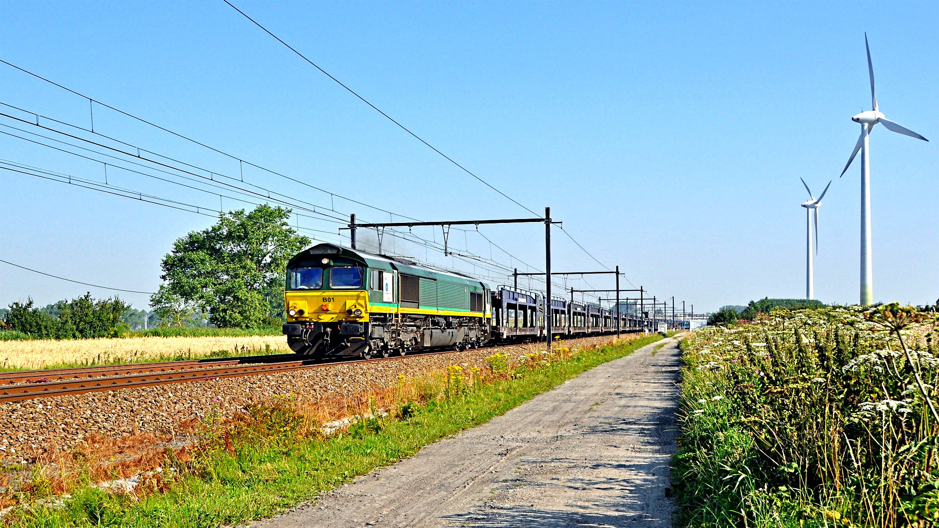 HD Scenic Freight Train Wallpaper: Power and Progress on Rails