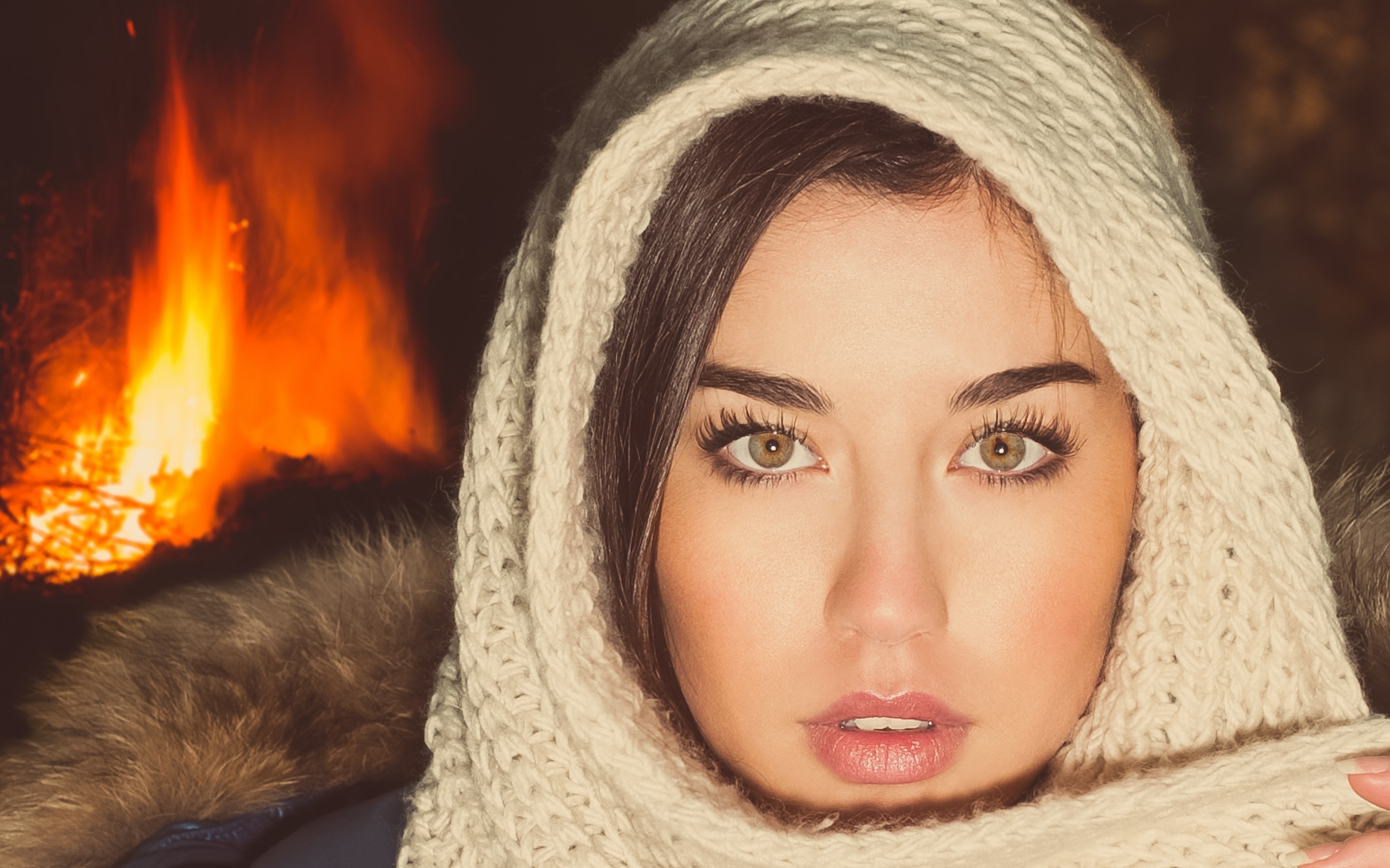 Radiant Woman's Face in Cozy Glow – HD Wallpaper Delight