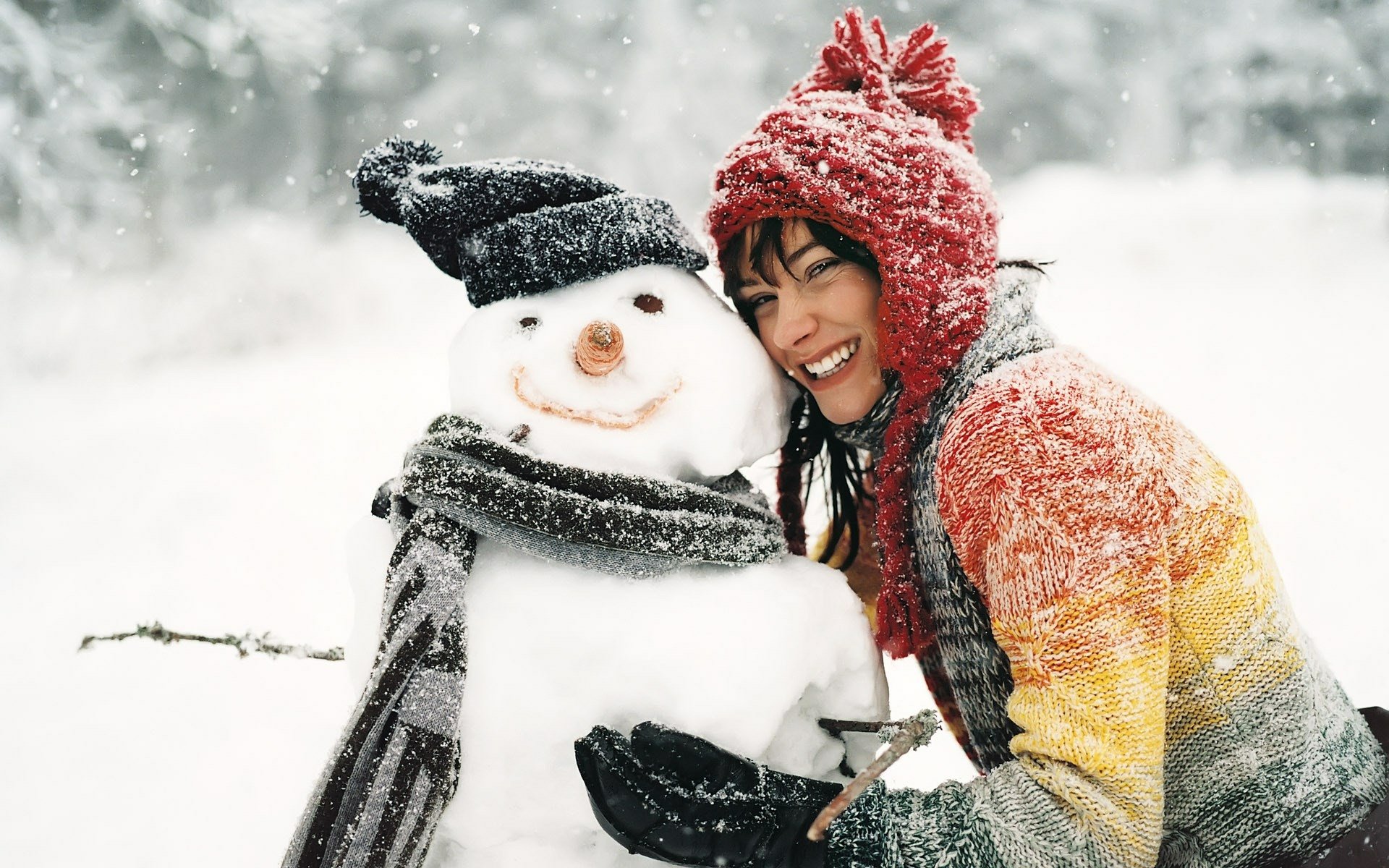 Winter Joy: Woman’s Warm Moment with Snowman HD Wallpaper | 1920x1200 ...