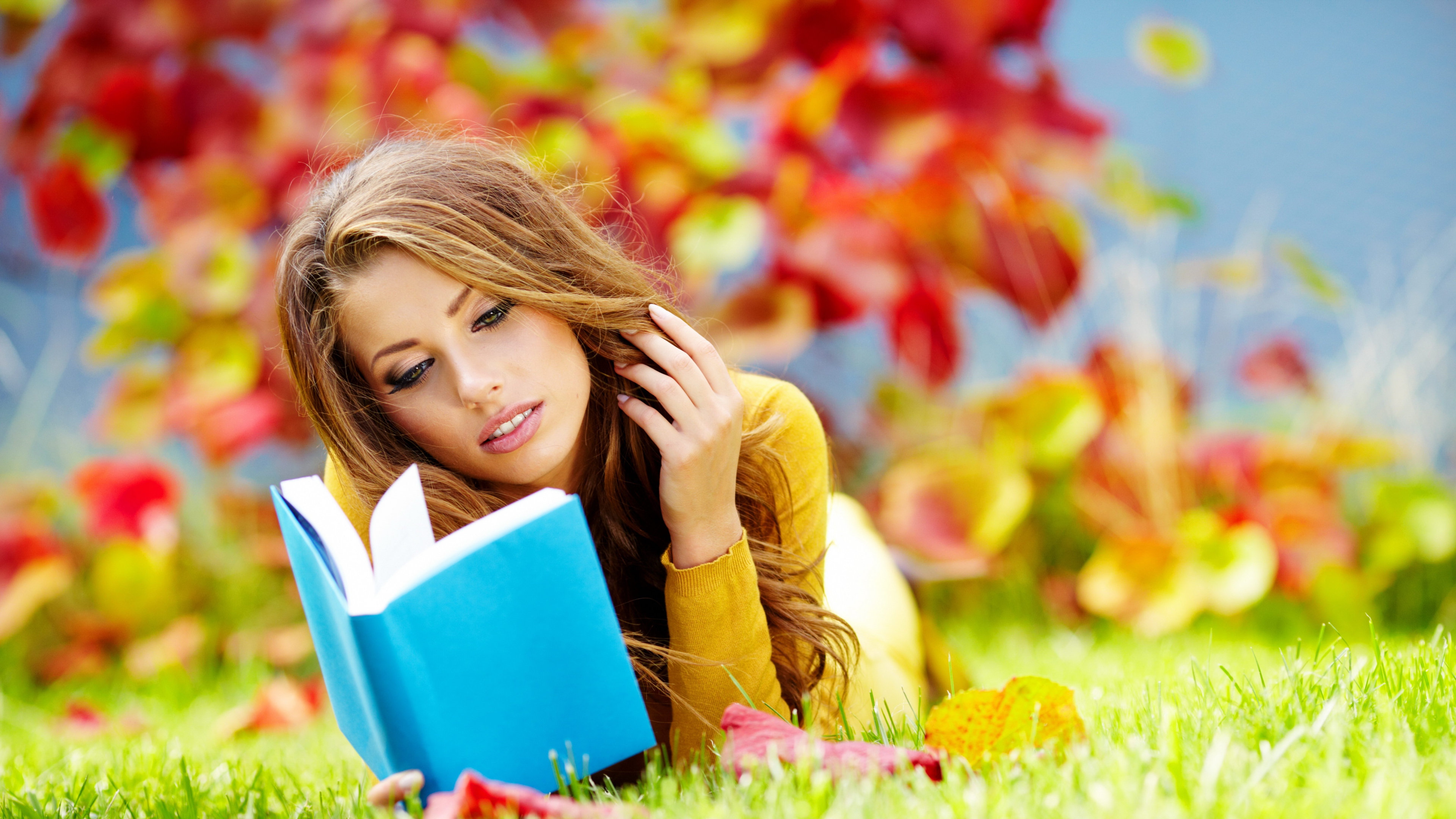 4K Ultra HD Autumn Elegance: Woman Model Immersed in Reading