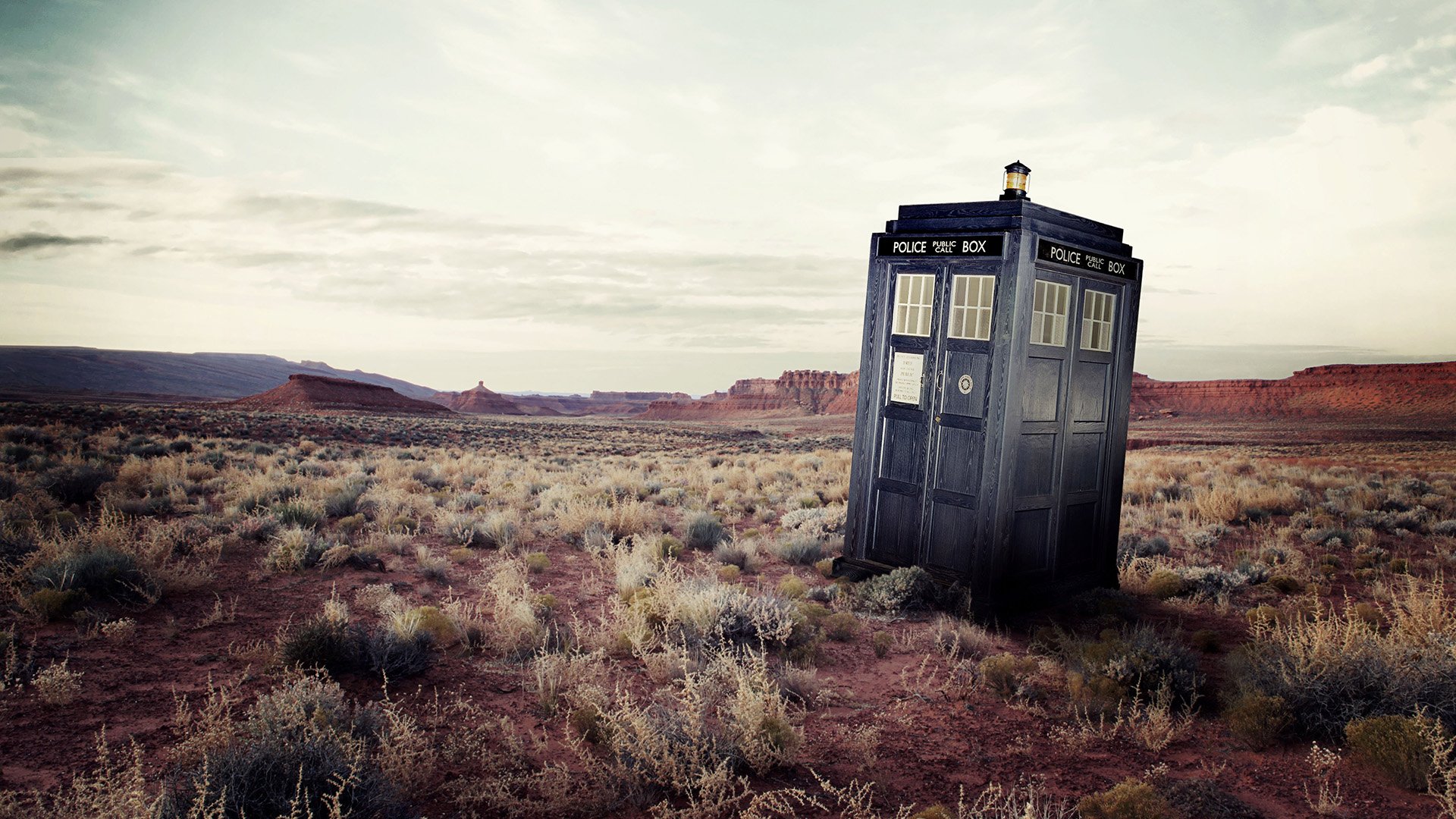 Doctor Who HD Wallpaper: The Iconic TARDIS in a Desert Landscape