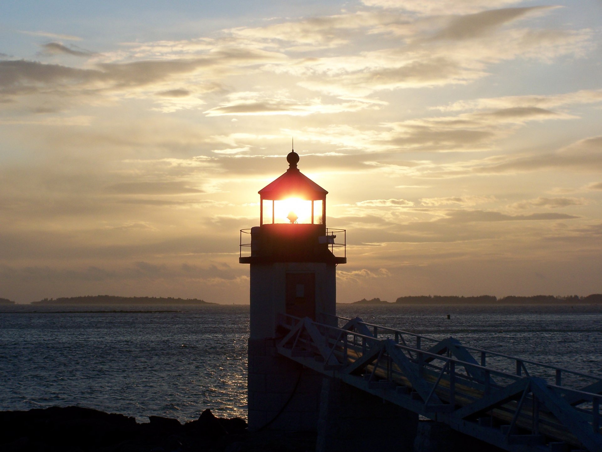 Beacon of Light: Stunning HD Lighthouse at Sunset Wallpaper